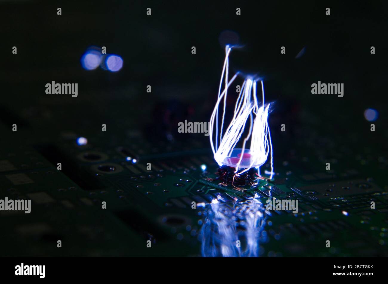 Small electrostatic lighting sparks closed to electronic components ...
