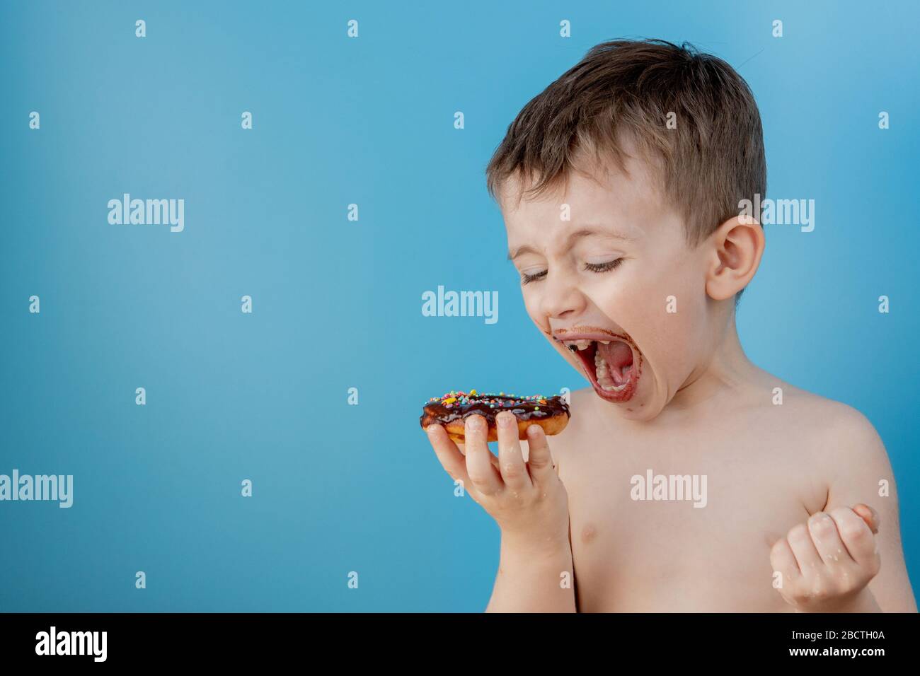 Boy eat chocolate child choco kid hi-res stock photography and images ...