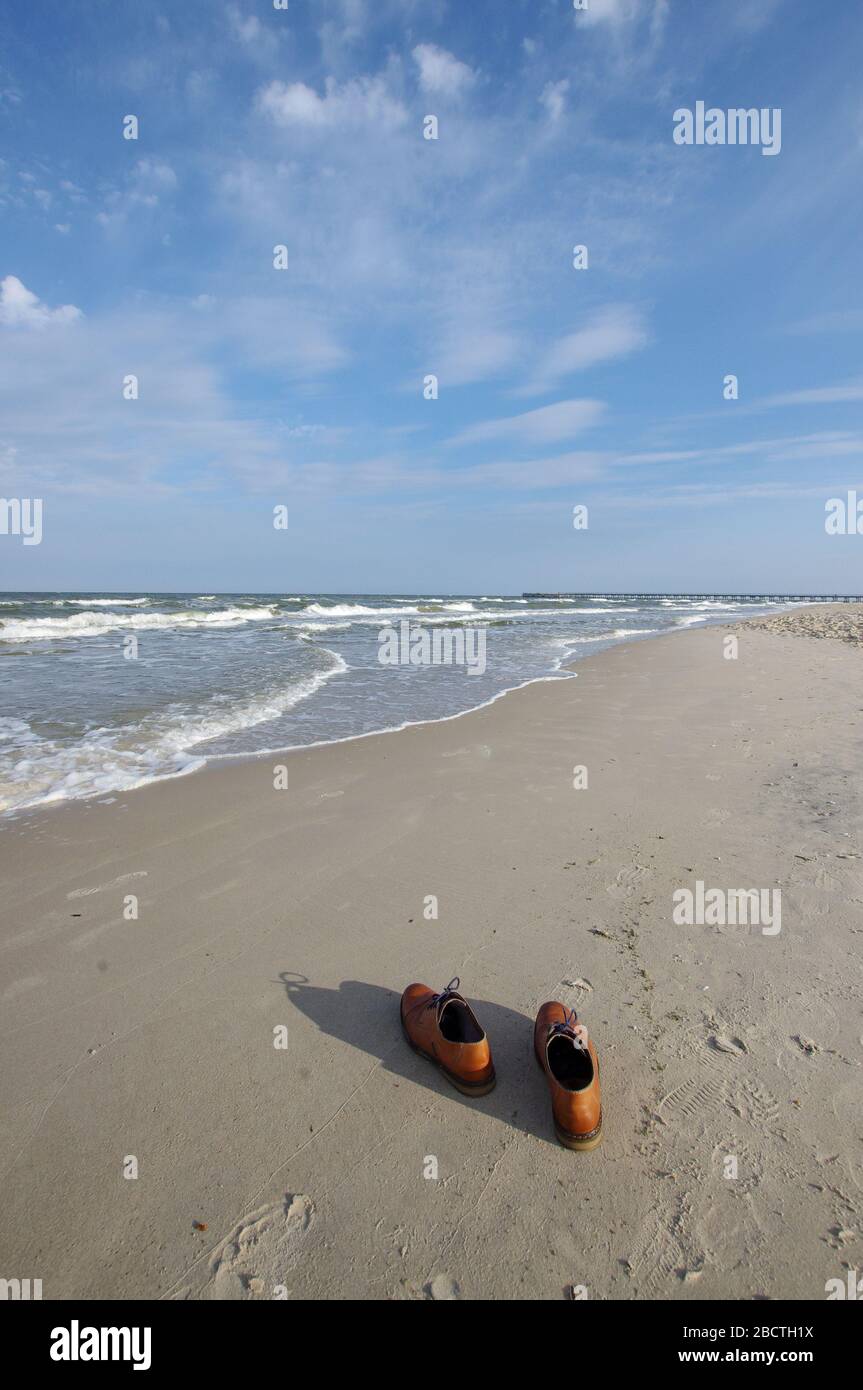 Shoes left on the beach hi-res stock photography and images - Alamy