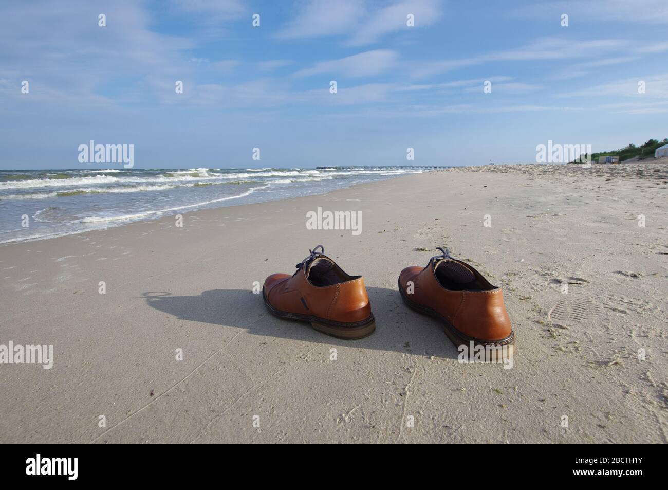 Shoes left on the beach hi-res stock photography and images - Alamy