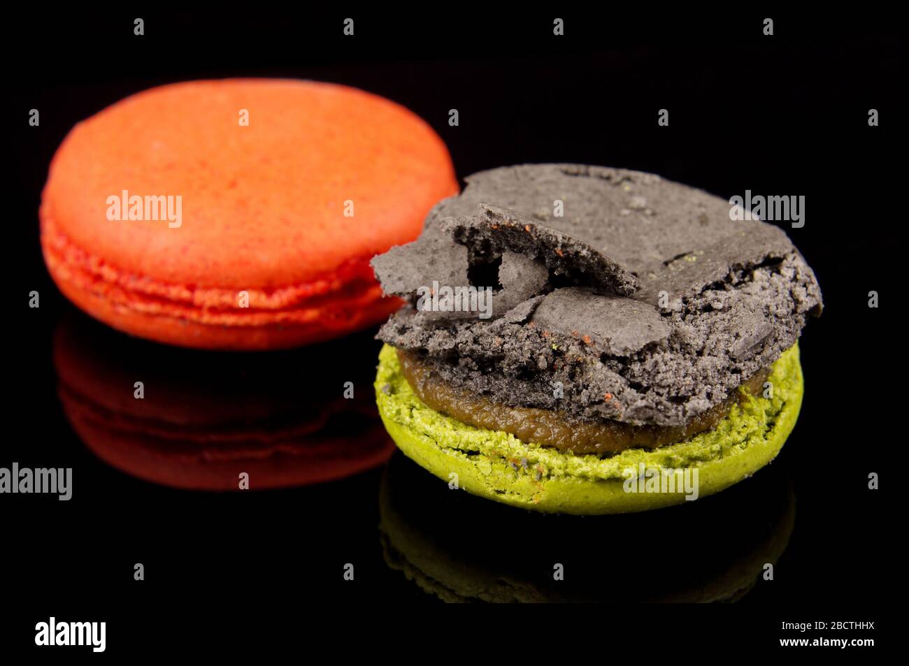 Broken french macaron. Popular biscuit Stock Photo - Alamy