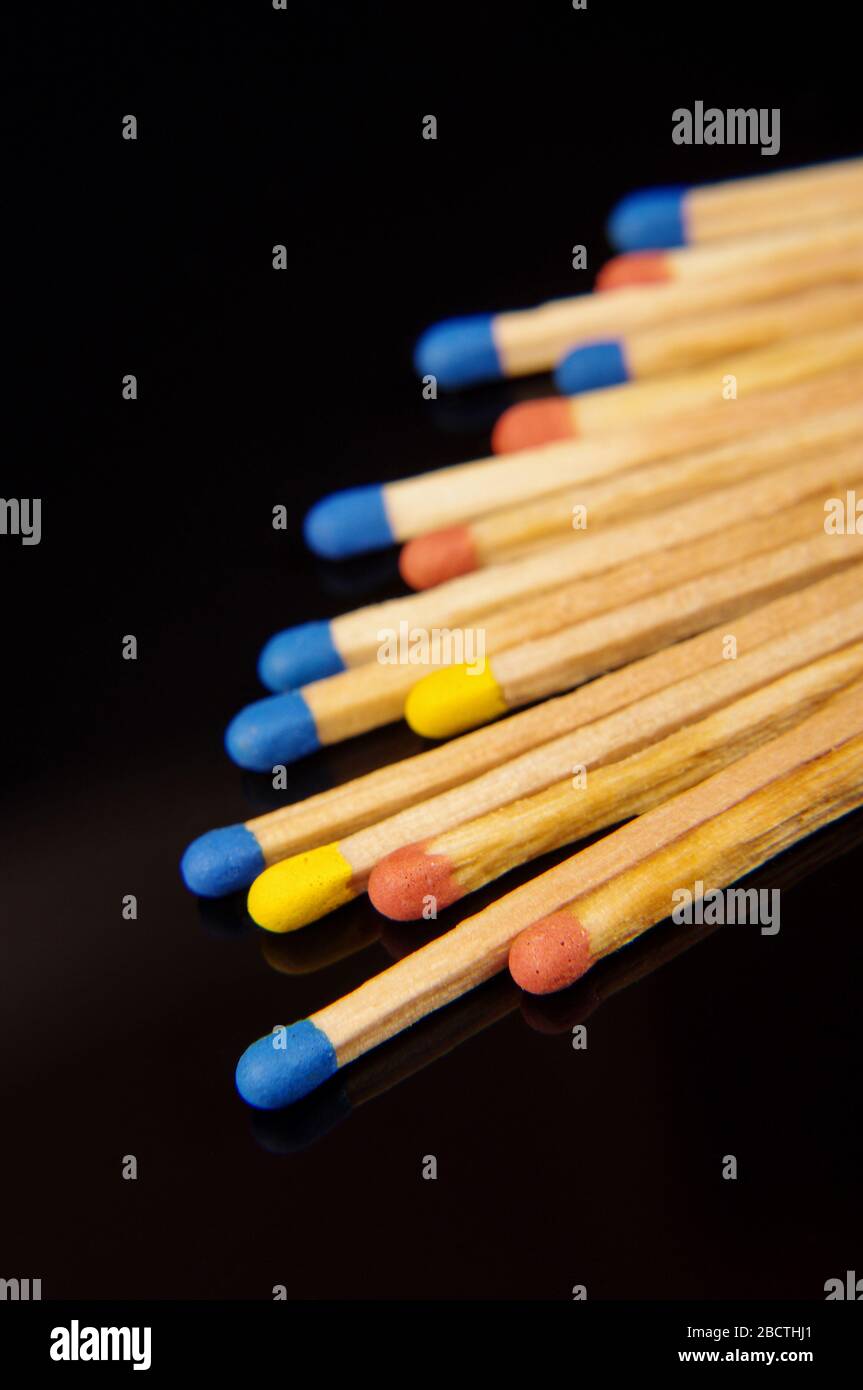 Group of matches on the dark background Stock Photo - Alamy