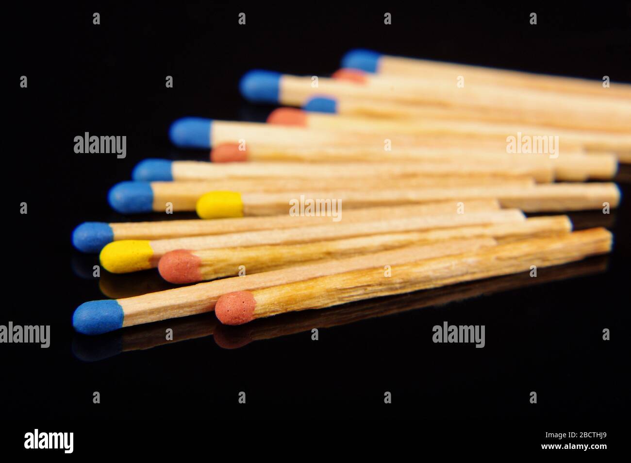 Group of matches on the dark background Stock Photo - Alamy