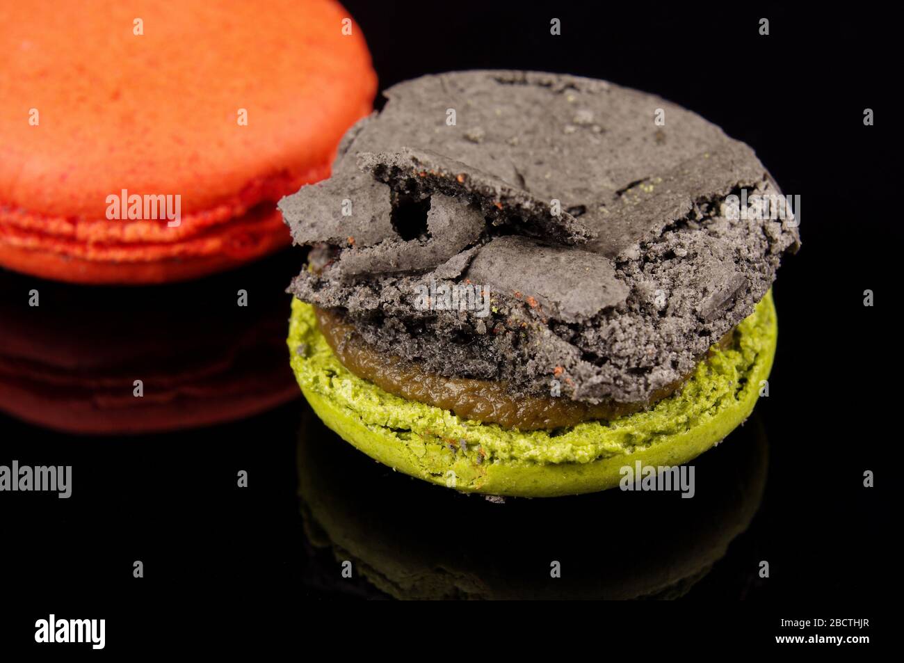 Broken french macaron. Popular biscuit Stock Photo - Alamy