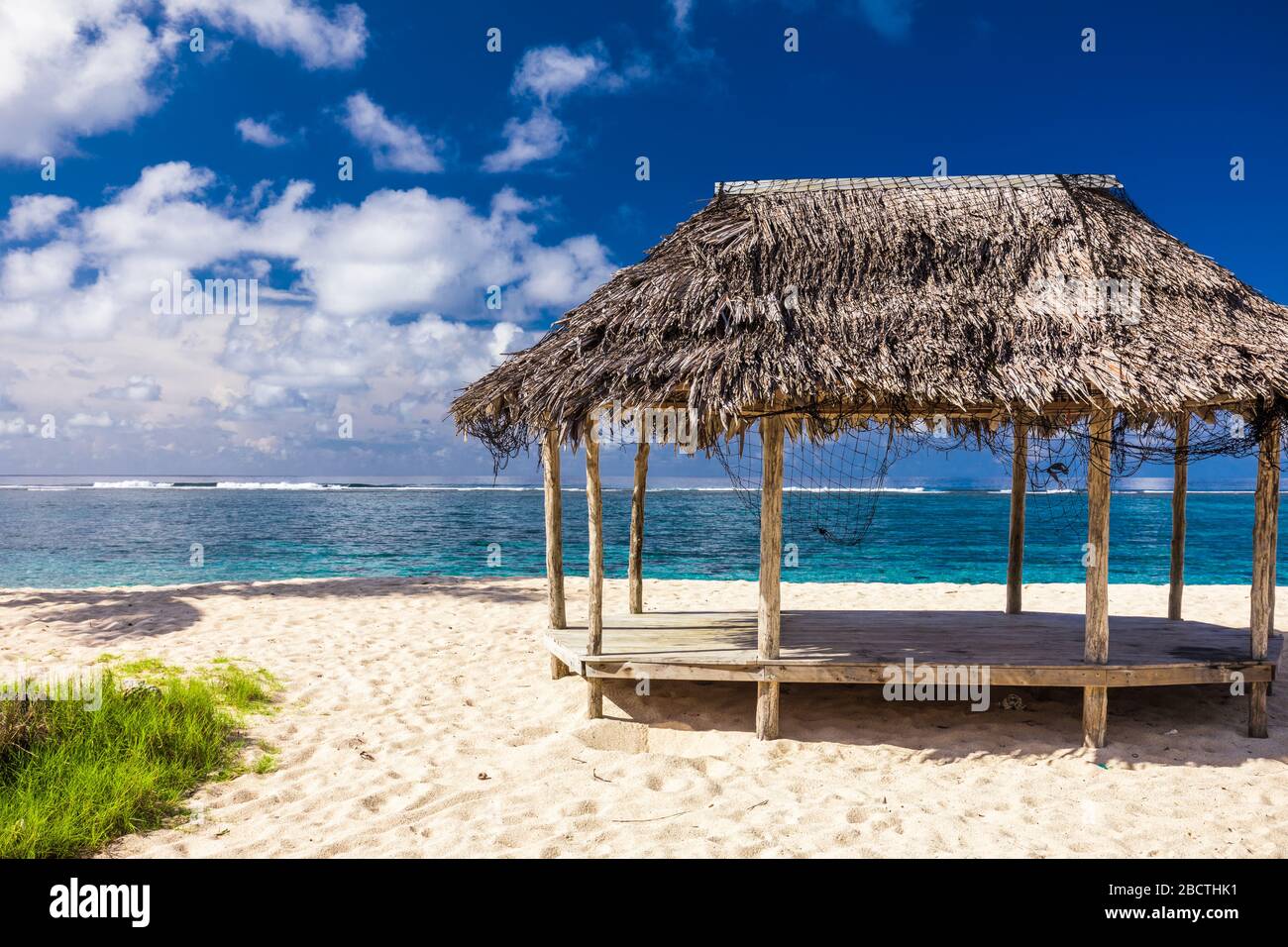 Lalomanu beach with open huts called fales, south side of Upolu Island ...