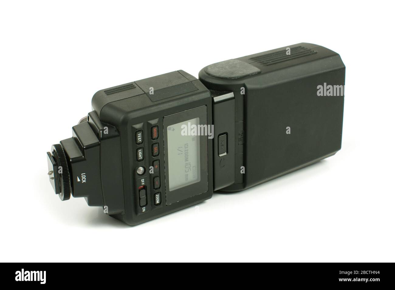 External DSLR photo camera flash called speedlight on the white ...