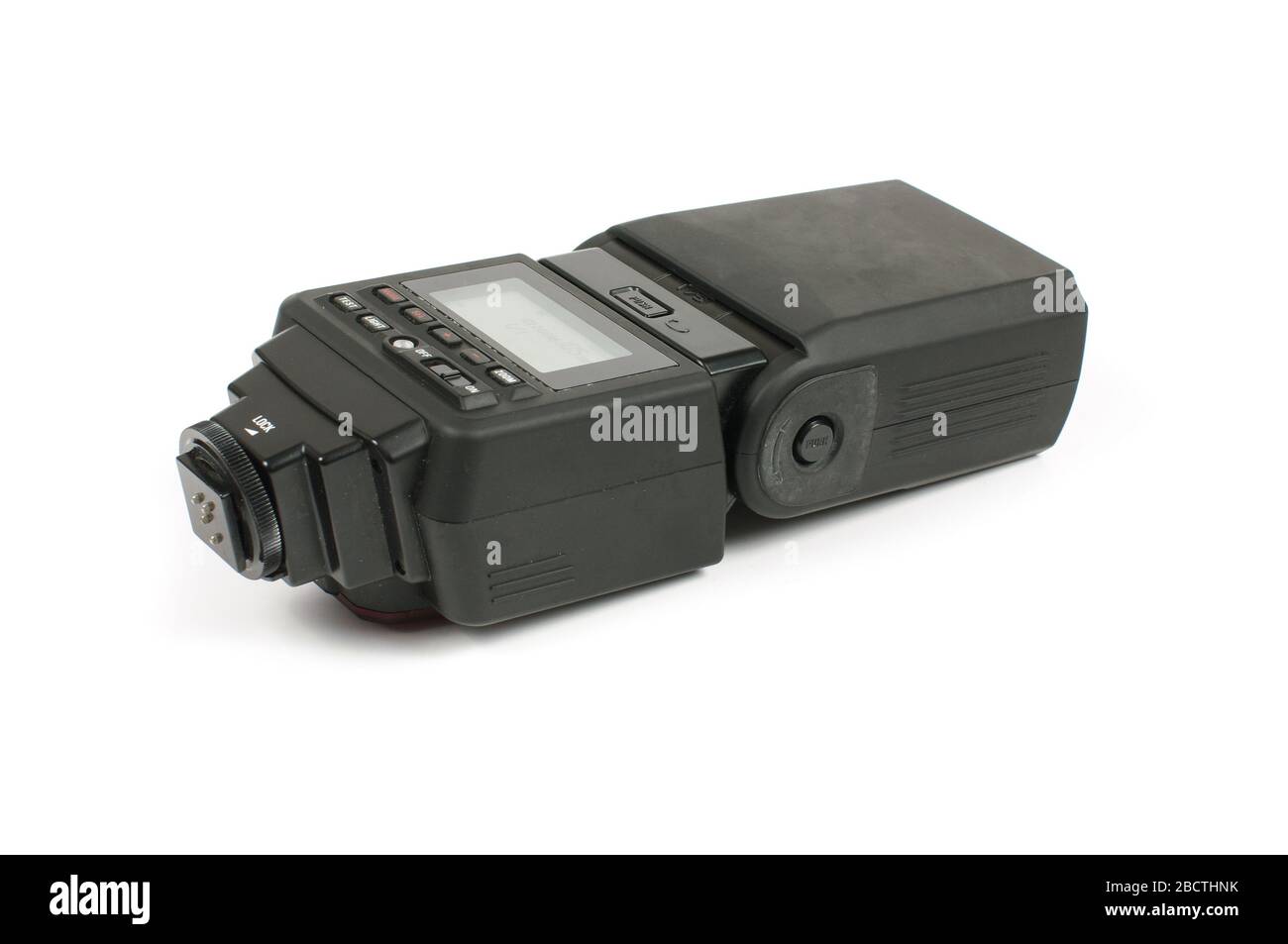 External DSLR photo camera flash called speedlight on the white ...