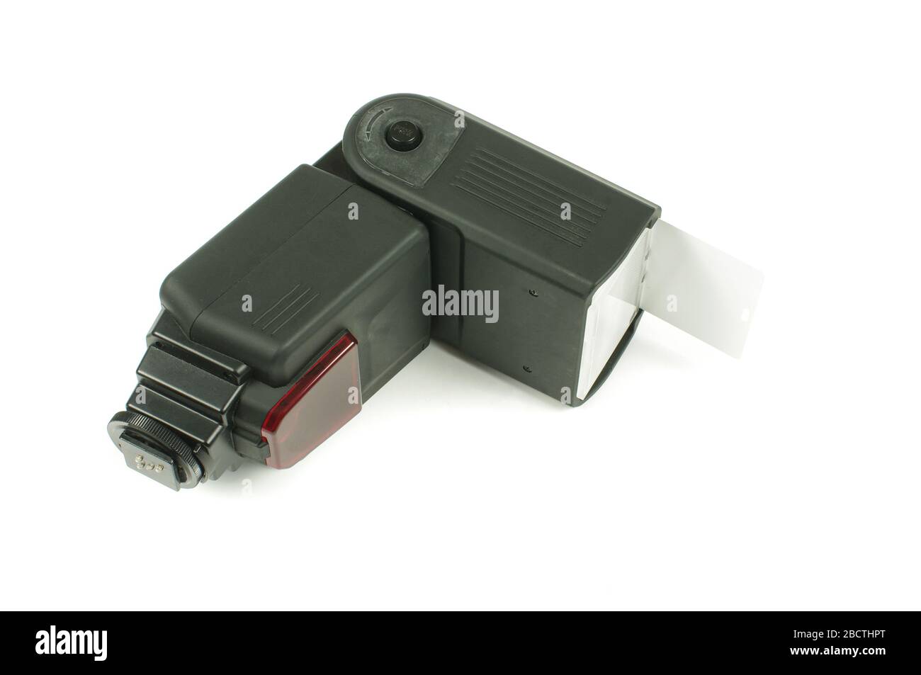 External DSLR photo camera flash called speedlight on the white ...