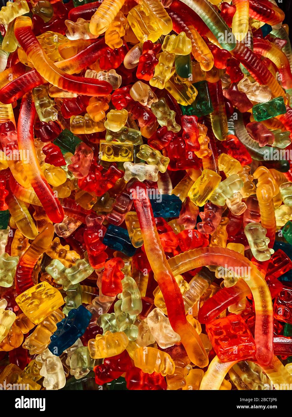 lots of delicious sweet candies for eating a pastry background Stock ...