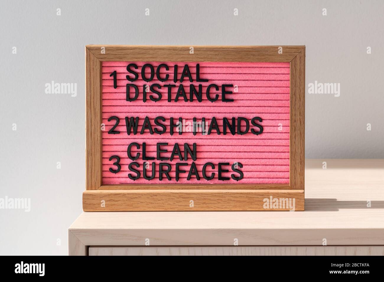 Coronavirus COVID-19 health safety guidelines. Text board in public ...