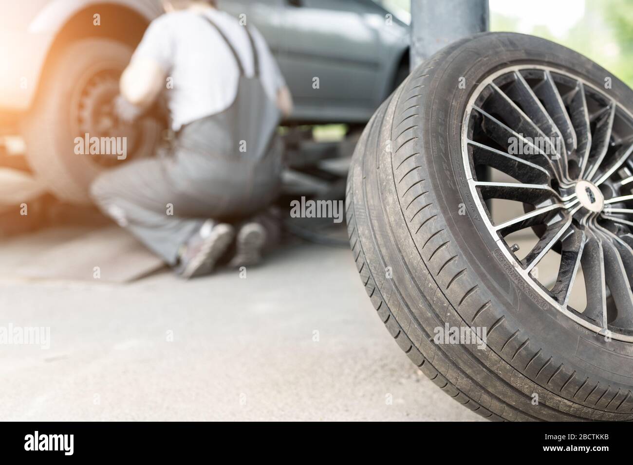 Car wheel repair shop outdoor ground . Seasonal winter tyre change at ...