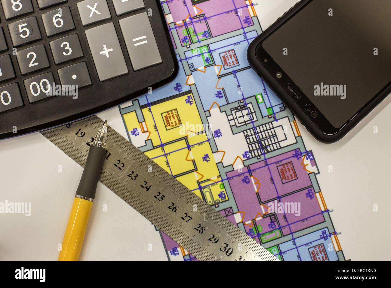 Calcurator, pen and ruler on building house architecture plan drawing ...