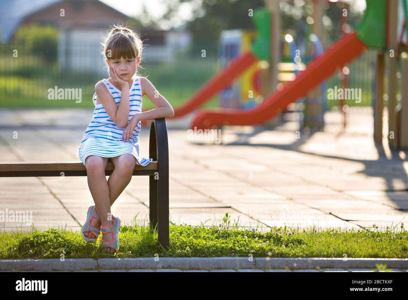 Child Playing Alone At School