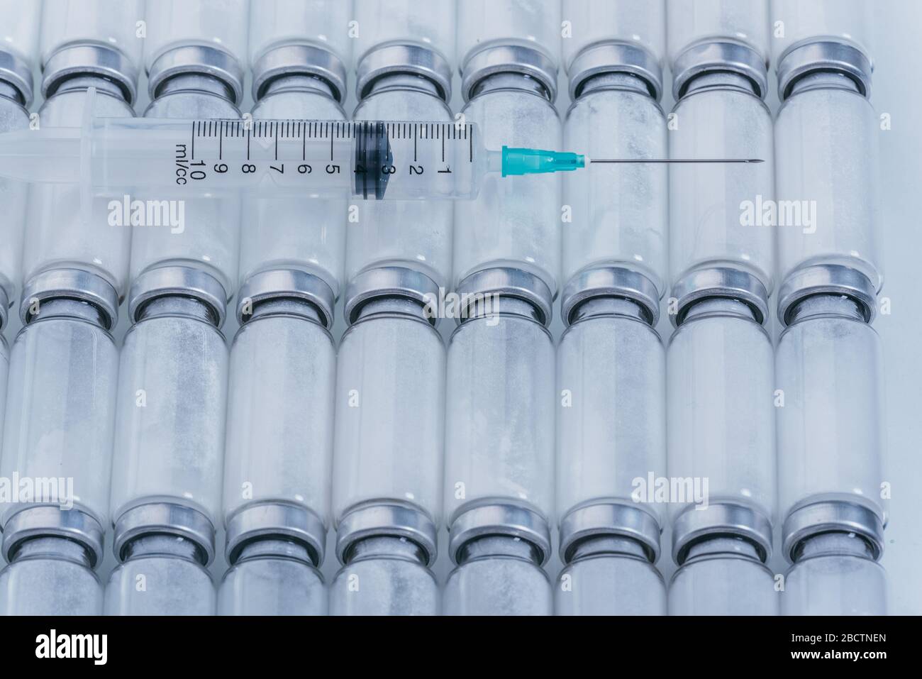 Medicine, Injection, vaccine and disposable syringe, drug concept ...