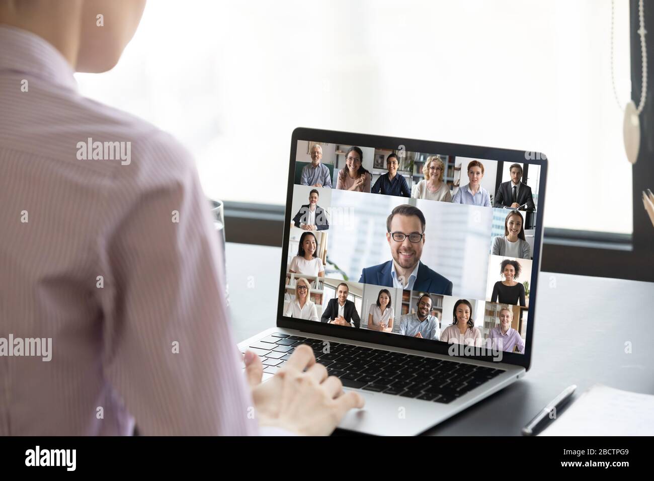 Multiracial people involved in group video call pc screen view Stock ...