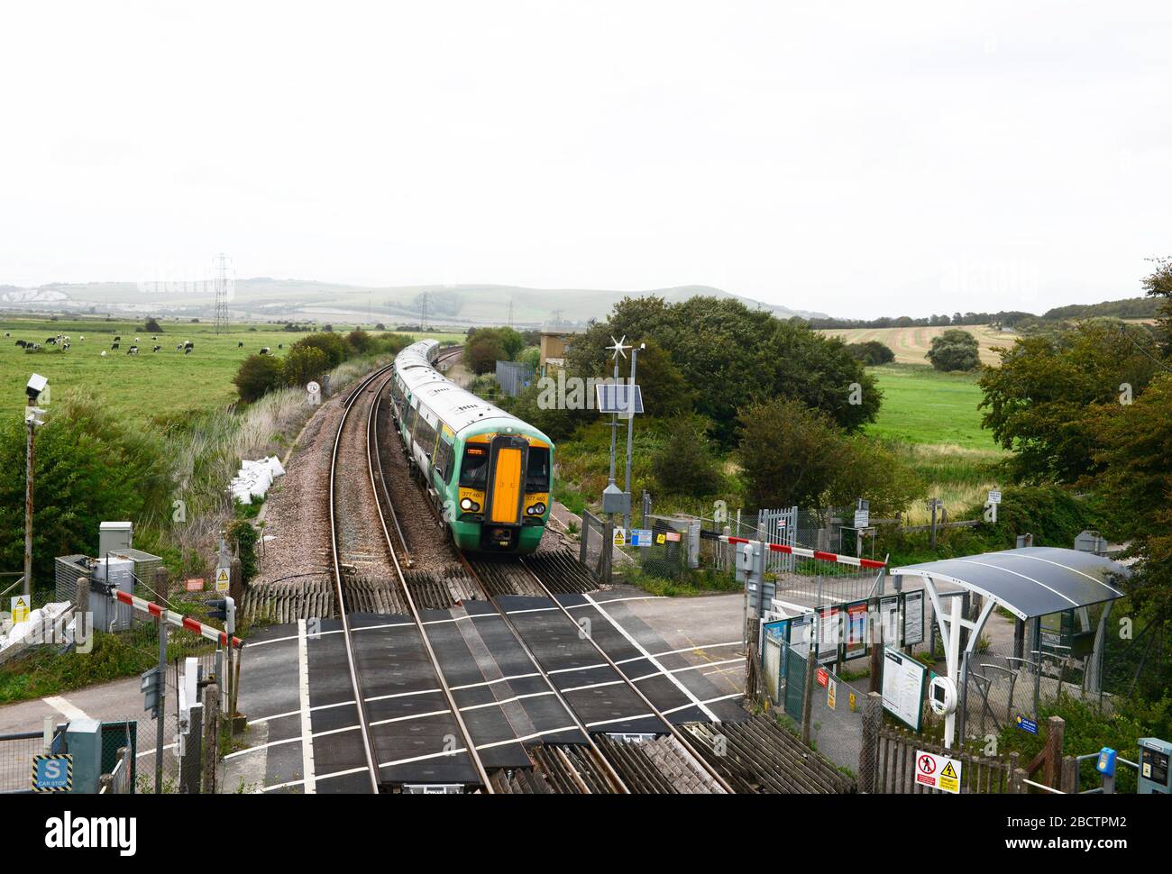 A train approaches Southease railway station, Sussex, UK Stock Photo ...