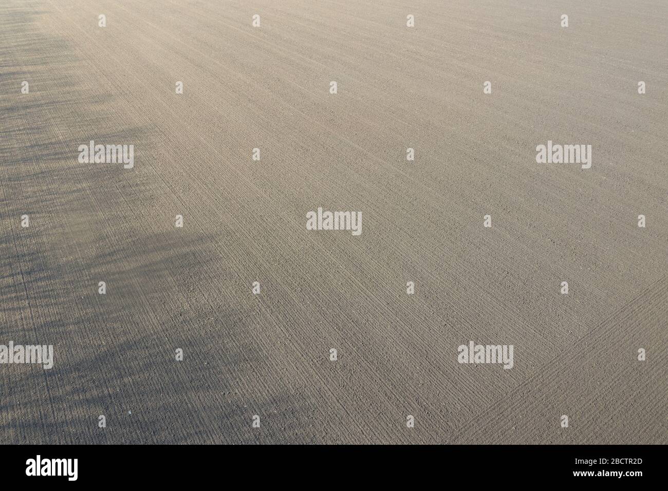 Aerial view of an empty cultivated agricultural field Stock Photo - Alamy