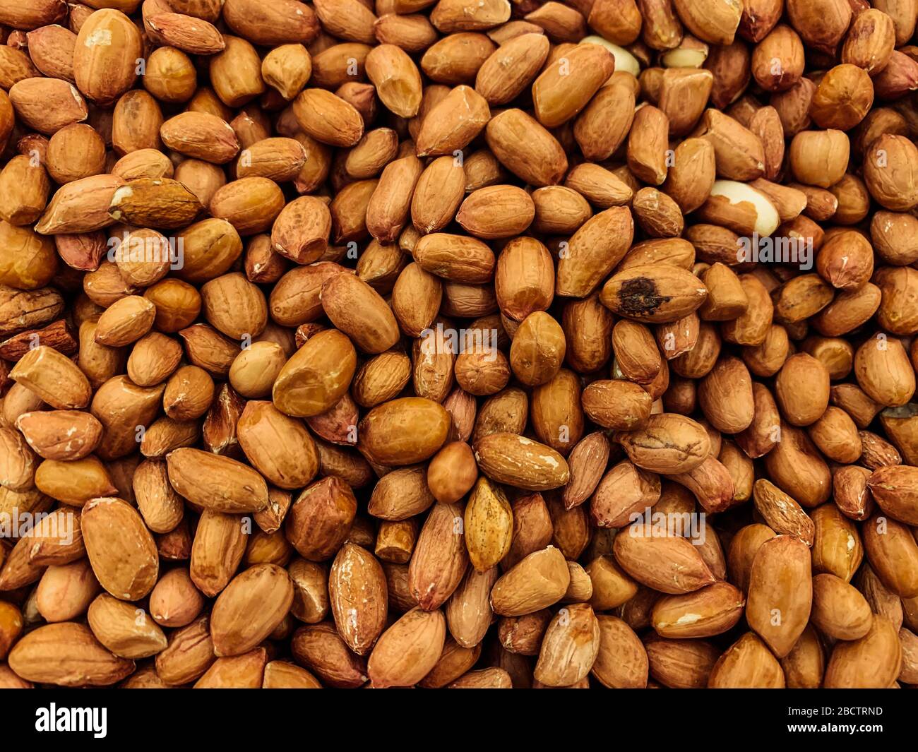 lots of peanuts for eating like the background Stock Photo - Alamy