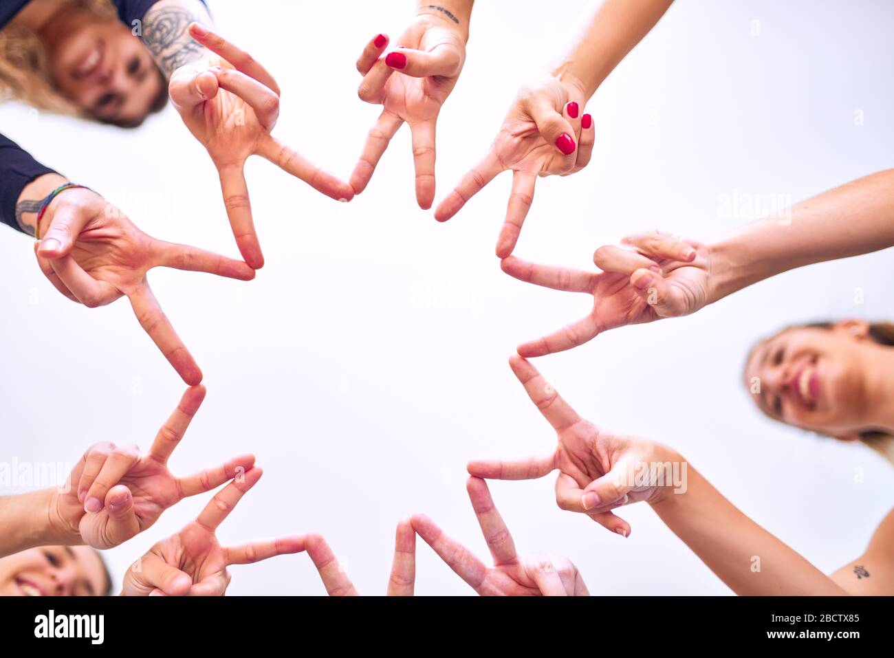 Young beautiful sportwomen doing gesture with hands Stock Photo - Alamy