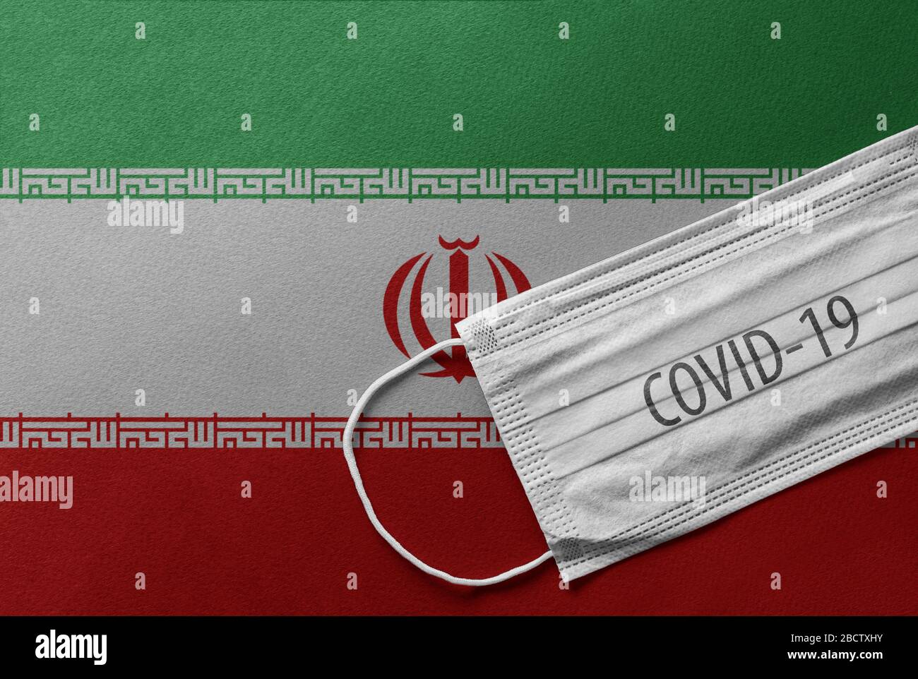 An individual face medical surgical mask on Iran National Flag ...