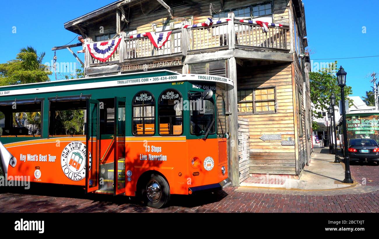 Trolley tours sightseeing bus on Key West - KEY WEST, USA - APRIL 12 ...