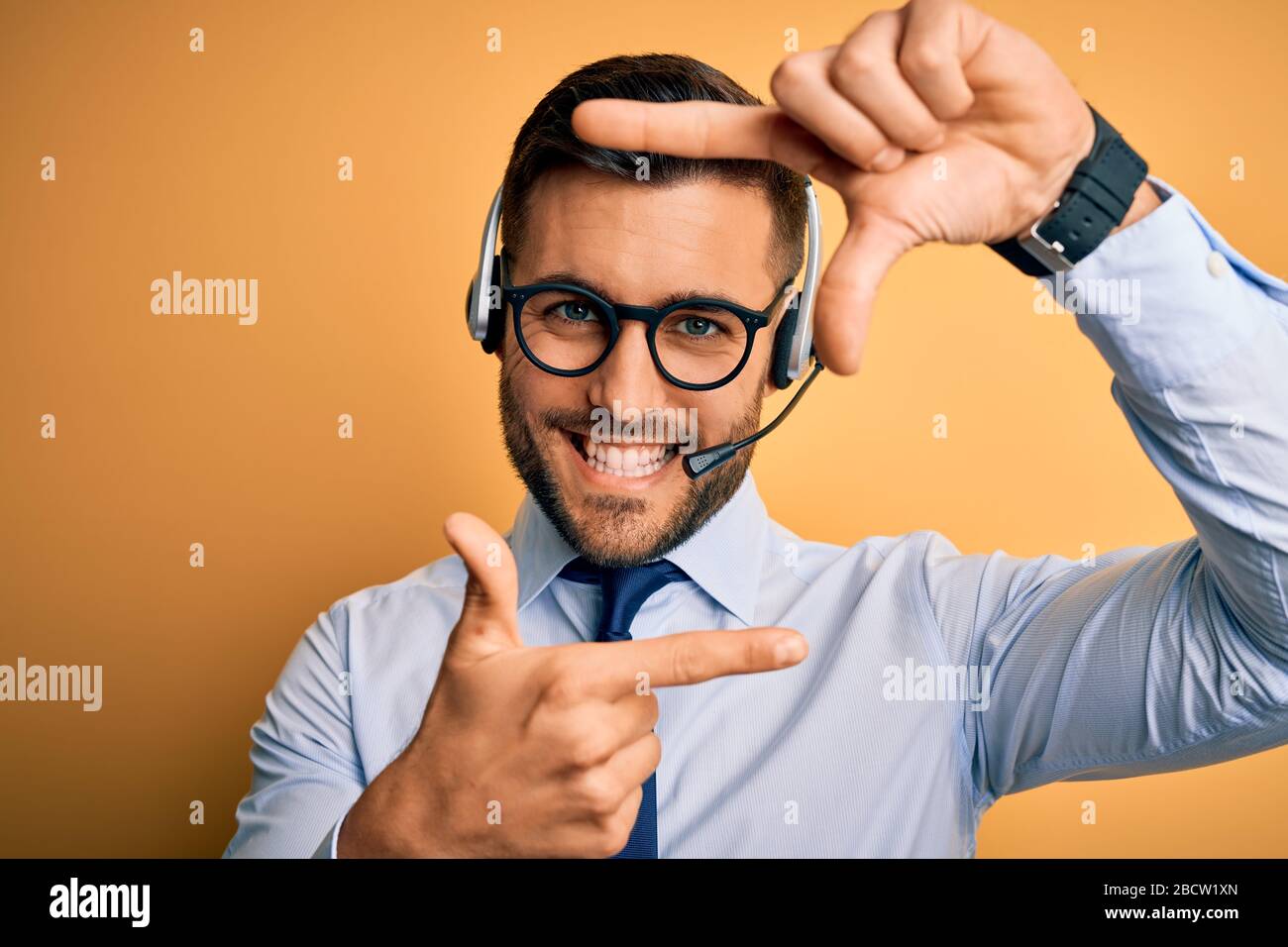 Young business operator man wearing customer service headset from call ...