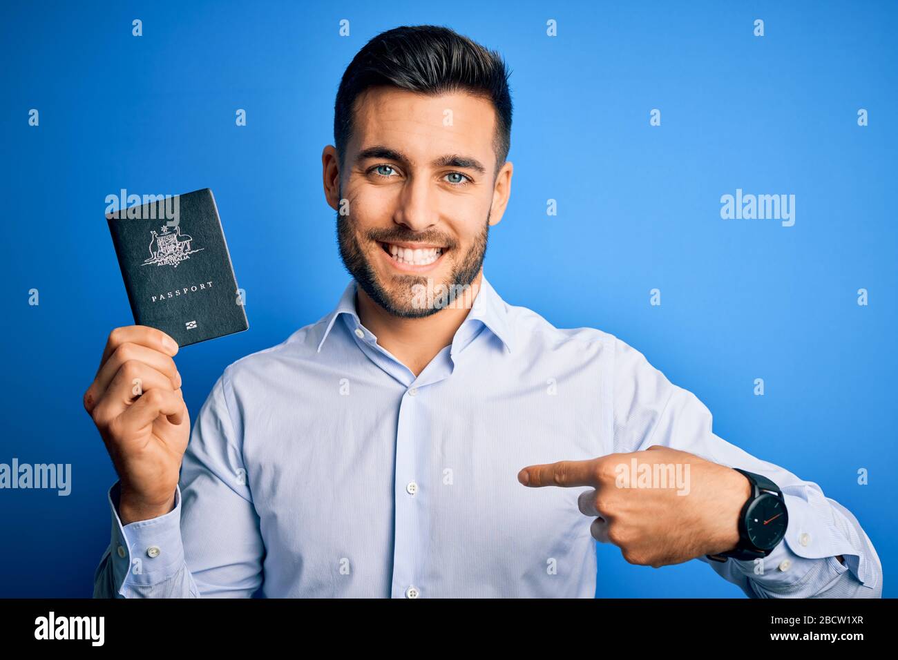 Young Handsome Tourist Man Holding Australia Australian Passport Id