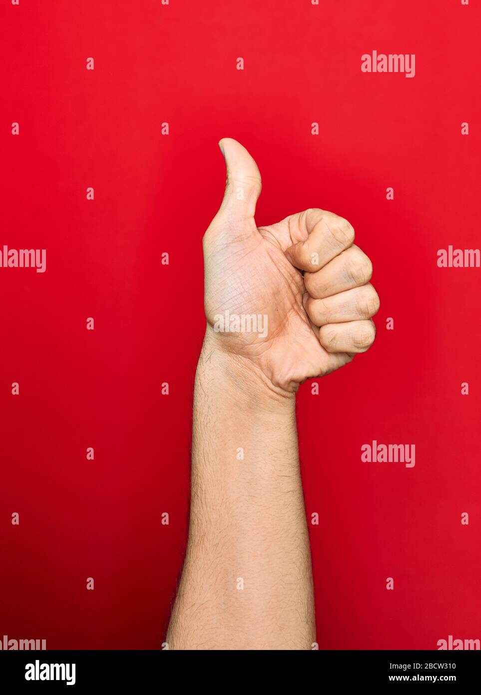 Beautiful hand of man doing okey sign with thumb up Stock Photo - Alamy