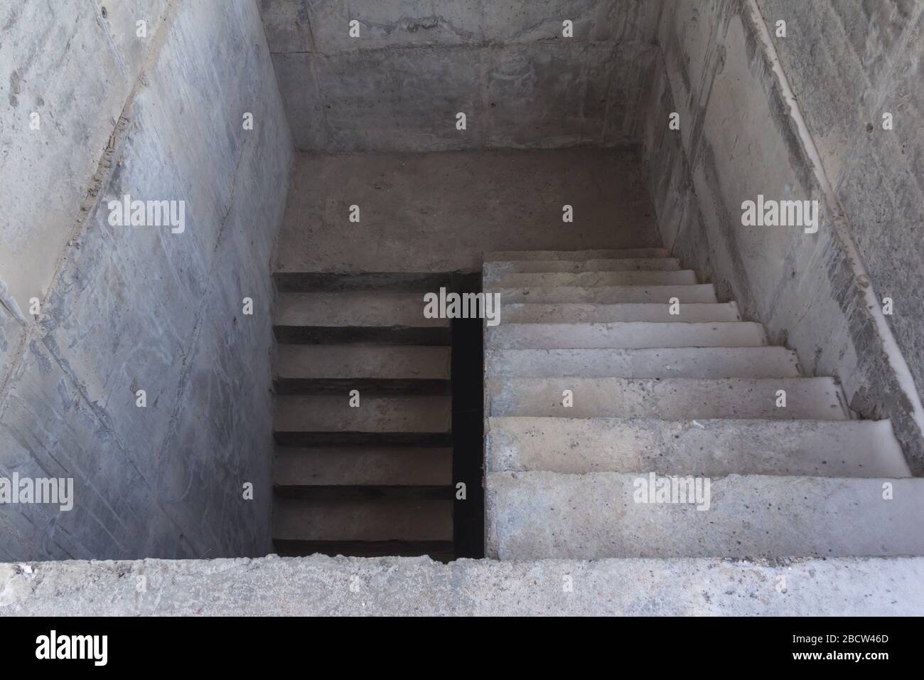 A ladder of concrete leading down. Concrete steps. Stairs down Stock ...