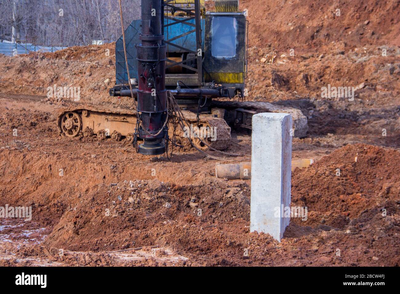 Concrete pile driving machine for a new building Stock Photo - Alamy