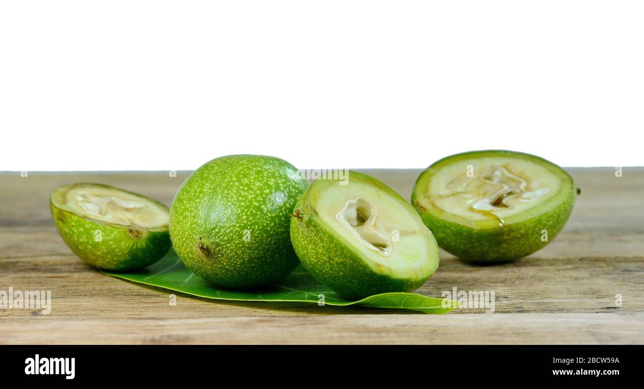 Walnut isolated on white background. Green young walnut. Nut in shell ...