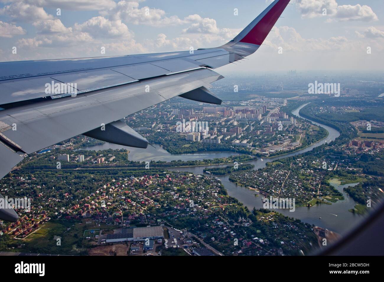 Aerial view of Moscow, Russia, from an airplane with wing traveling ...