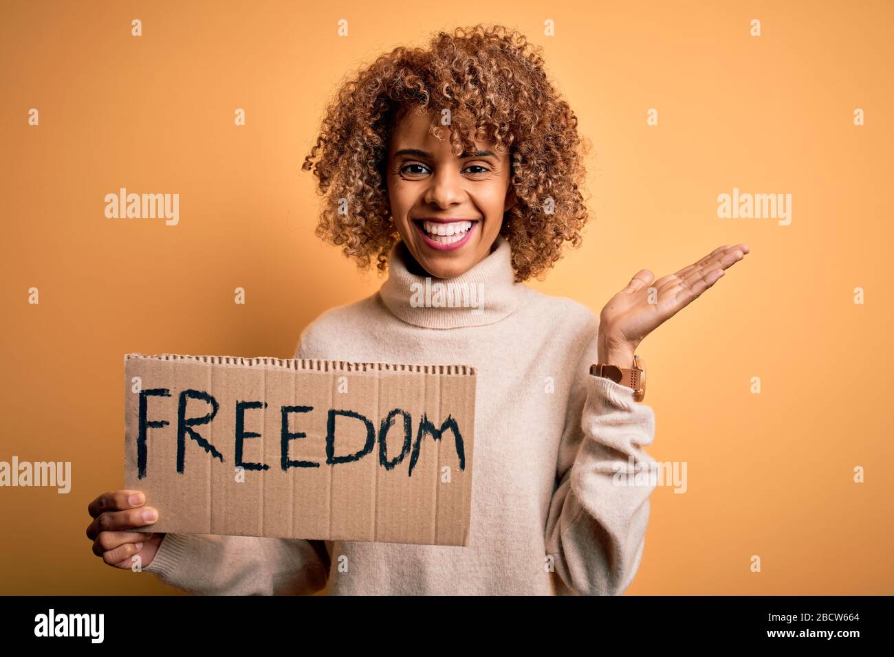 African american activist woman asking for liberty holding banner with ...