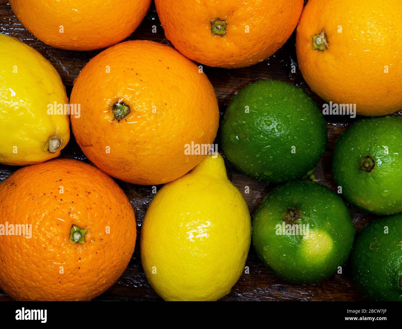 Top view angle of citrus fruits on table Stock Photo - Alamy