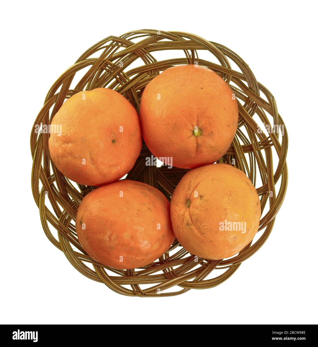 Orange in basket on white background Stock Photo - Alamy