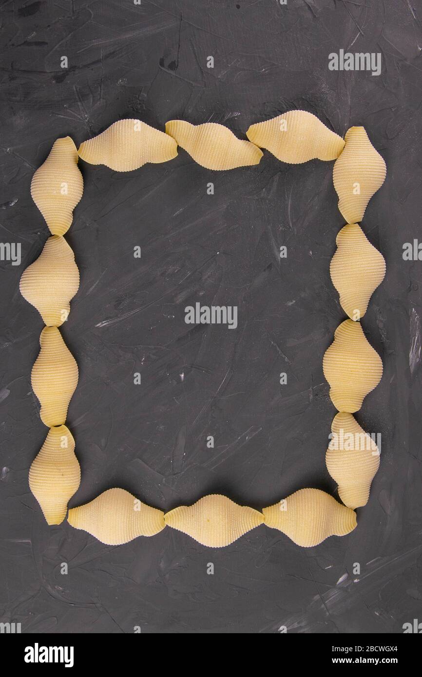 Conchiglie pasta shell composition in the shape of a rectangle with an ...