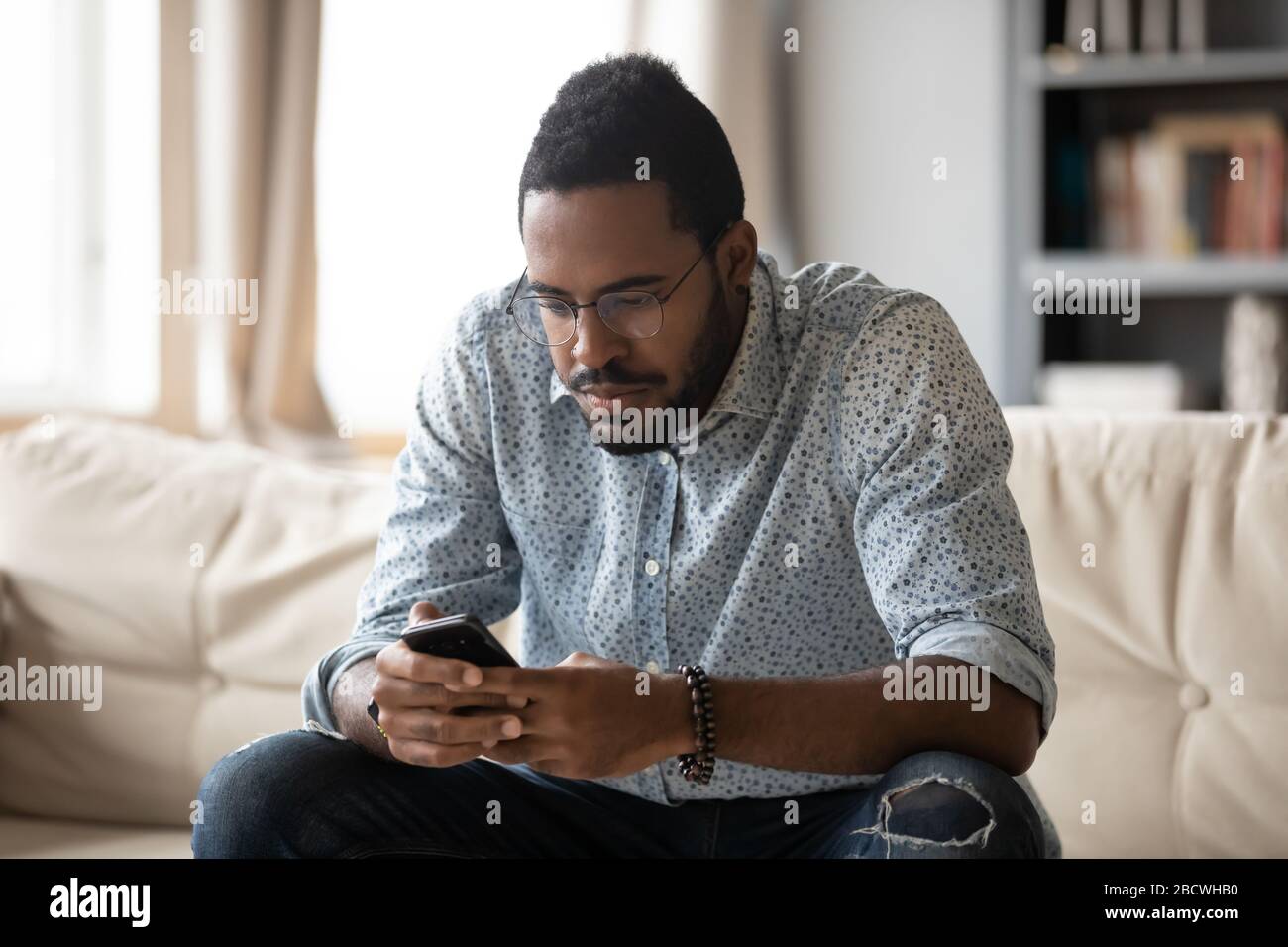 African american man sit hi-res stock photography and images - Alamy