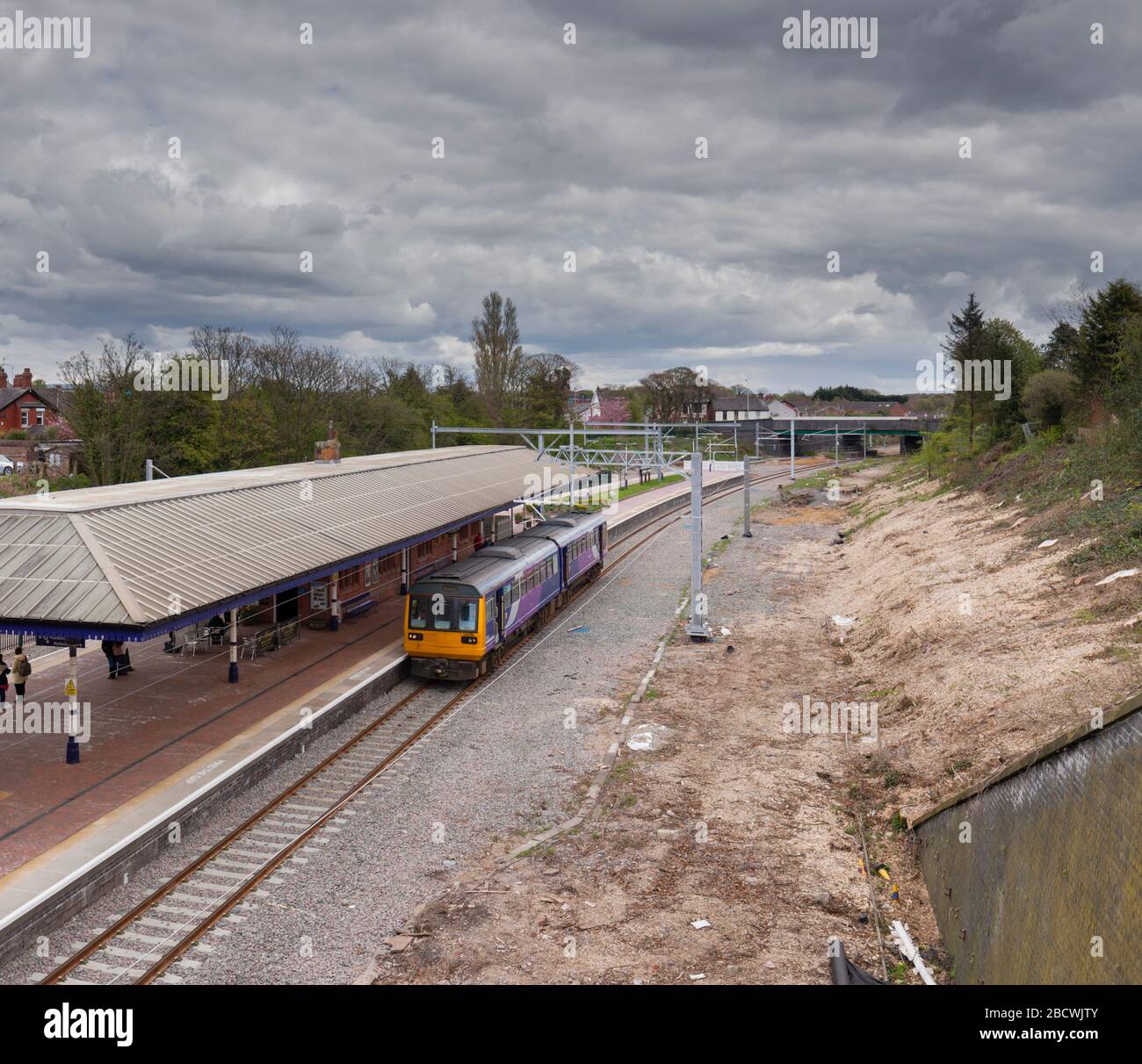 Northern rail class 142 pacer train 142092 passing Poulton Le Fylde railway station with a ...