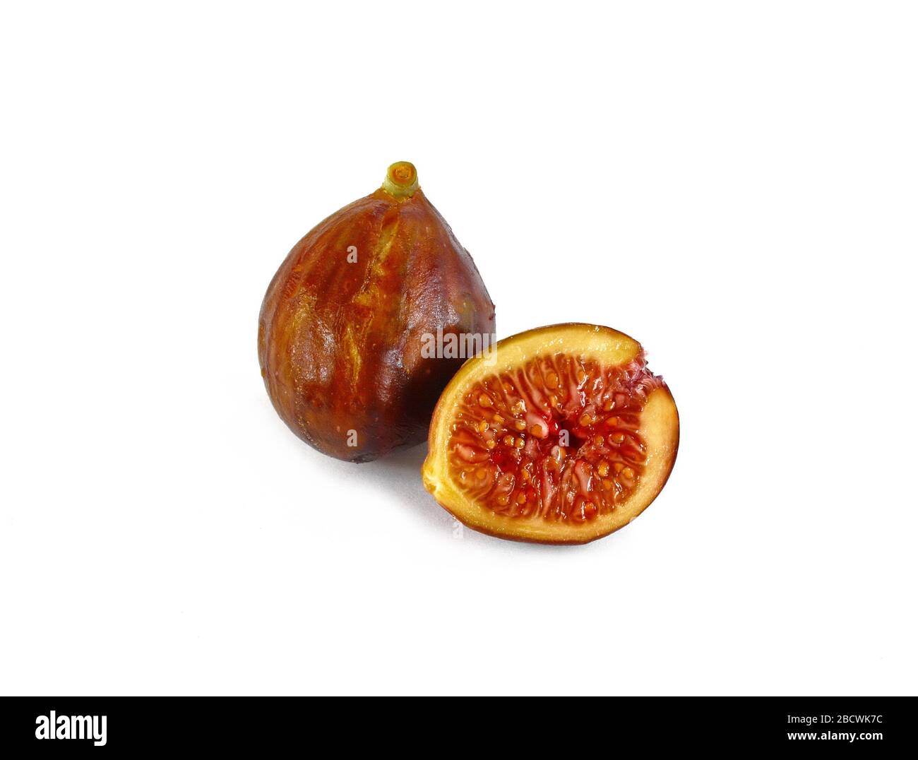 fresh figs and cut figs isolated on white background Stock Photo - Alamy