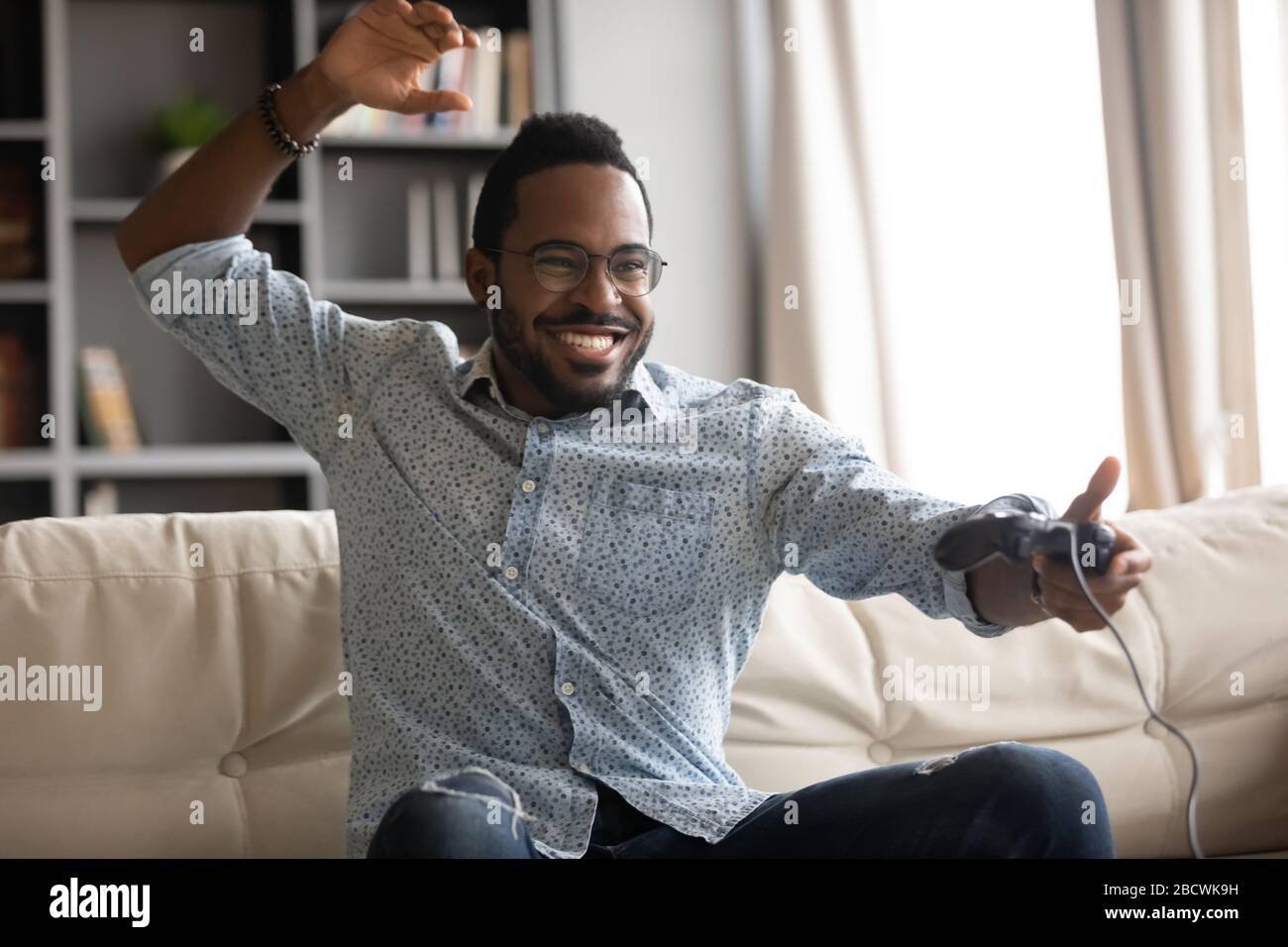 Excited black male gamer hi-res stock photography and images - Alamy