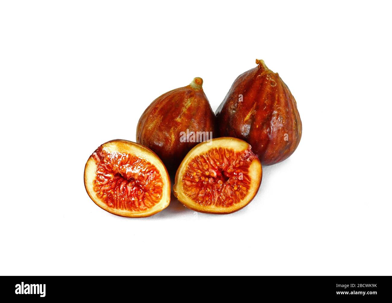 fresh figs and cut figs isolated on white background Stock Photo - Alamy