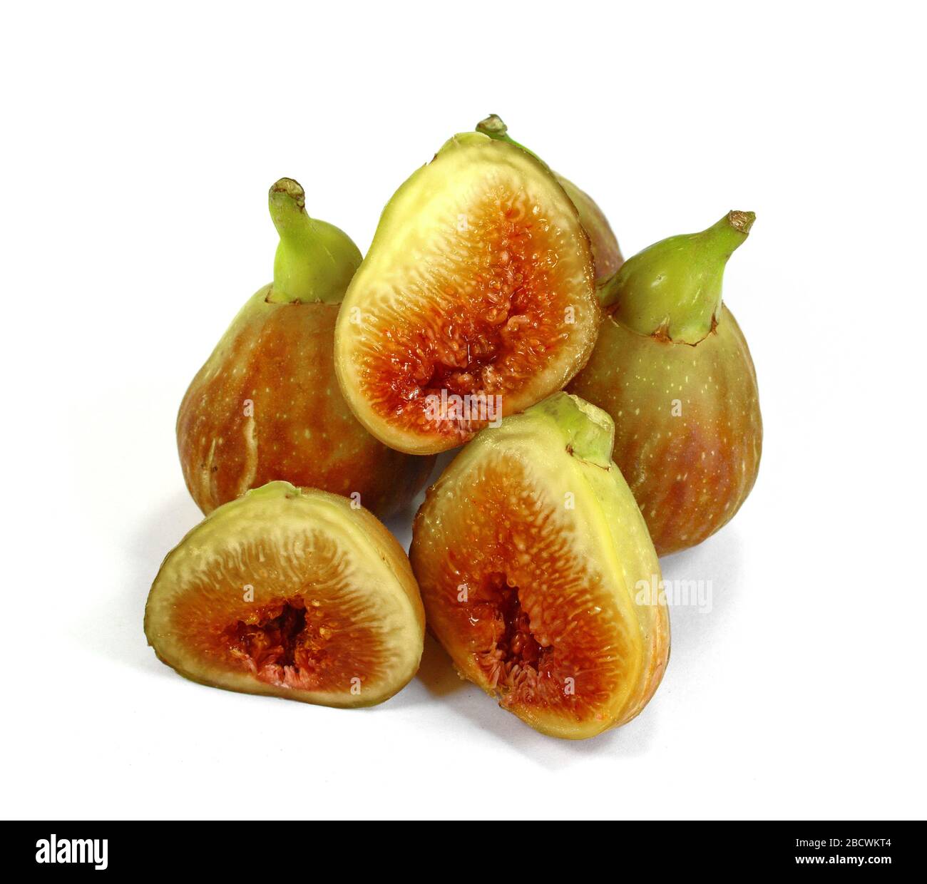 fresh figs and cut figs isolated on white background Stock Photo - Alamy