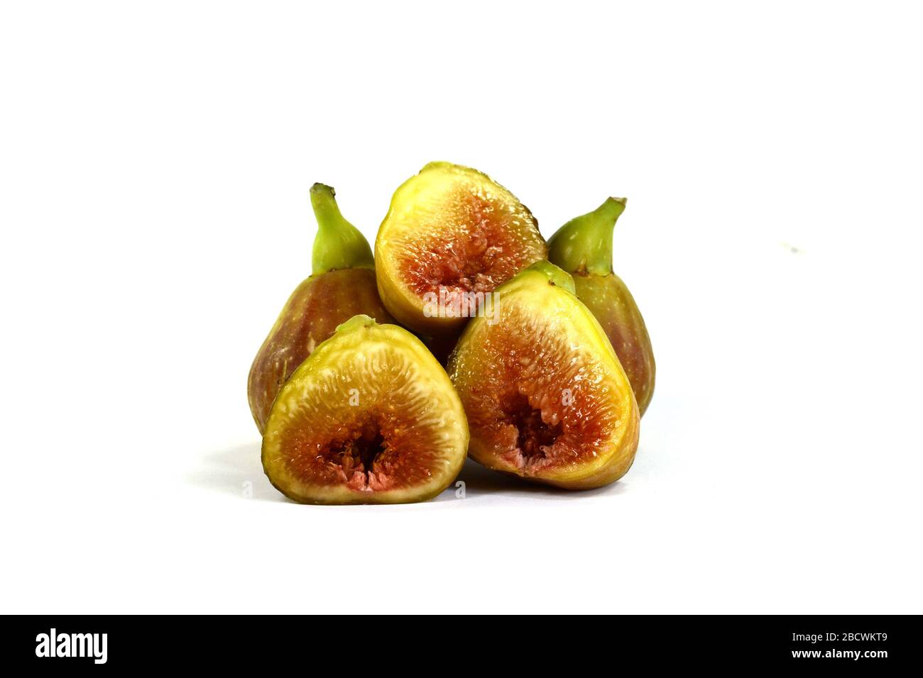 fresh figs and cut figs isolated on white background Stock Photo - Alamy