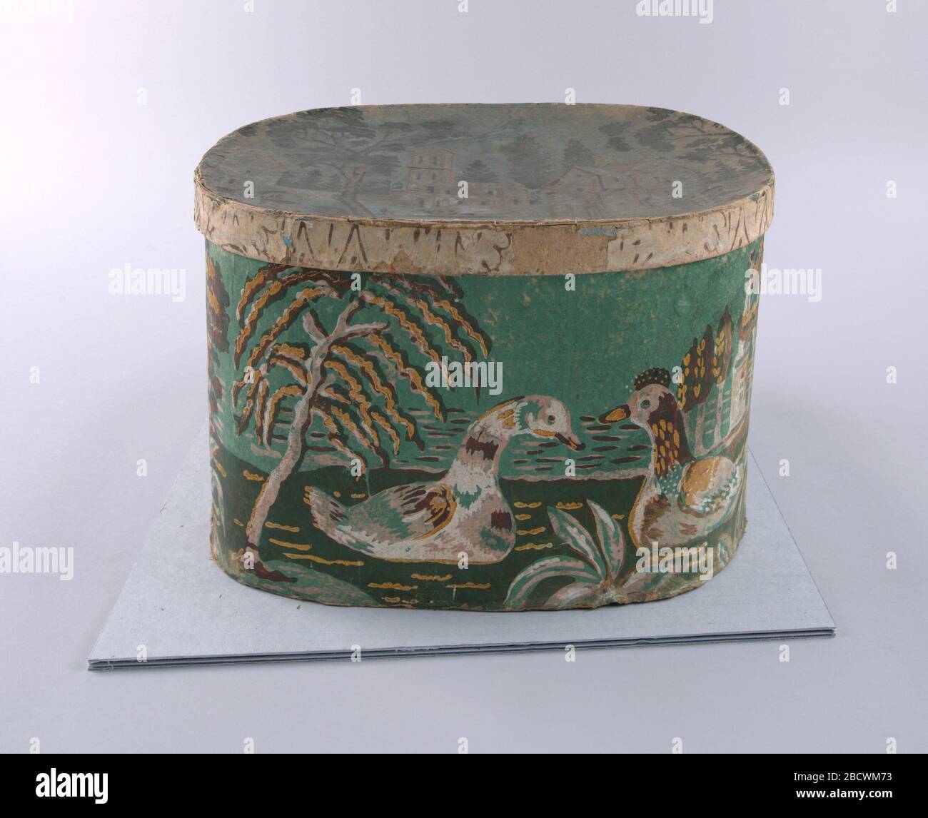 Bandbox. Research in ProgressSide decorated with ducks on water, with ...