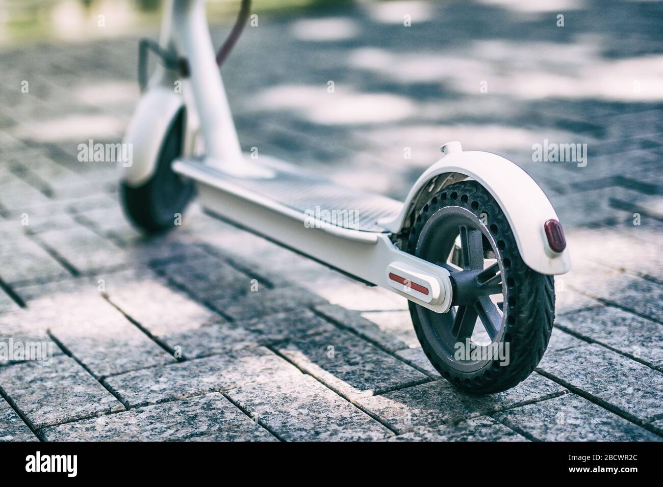 Close up view on eco friendly transport electro scooter on city ...