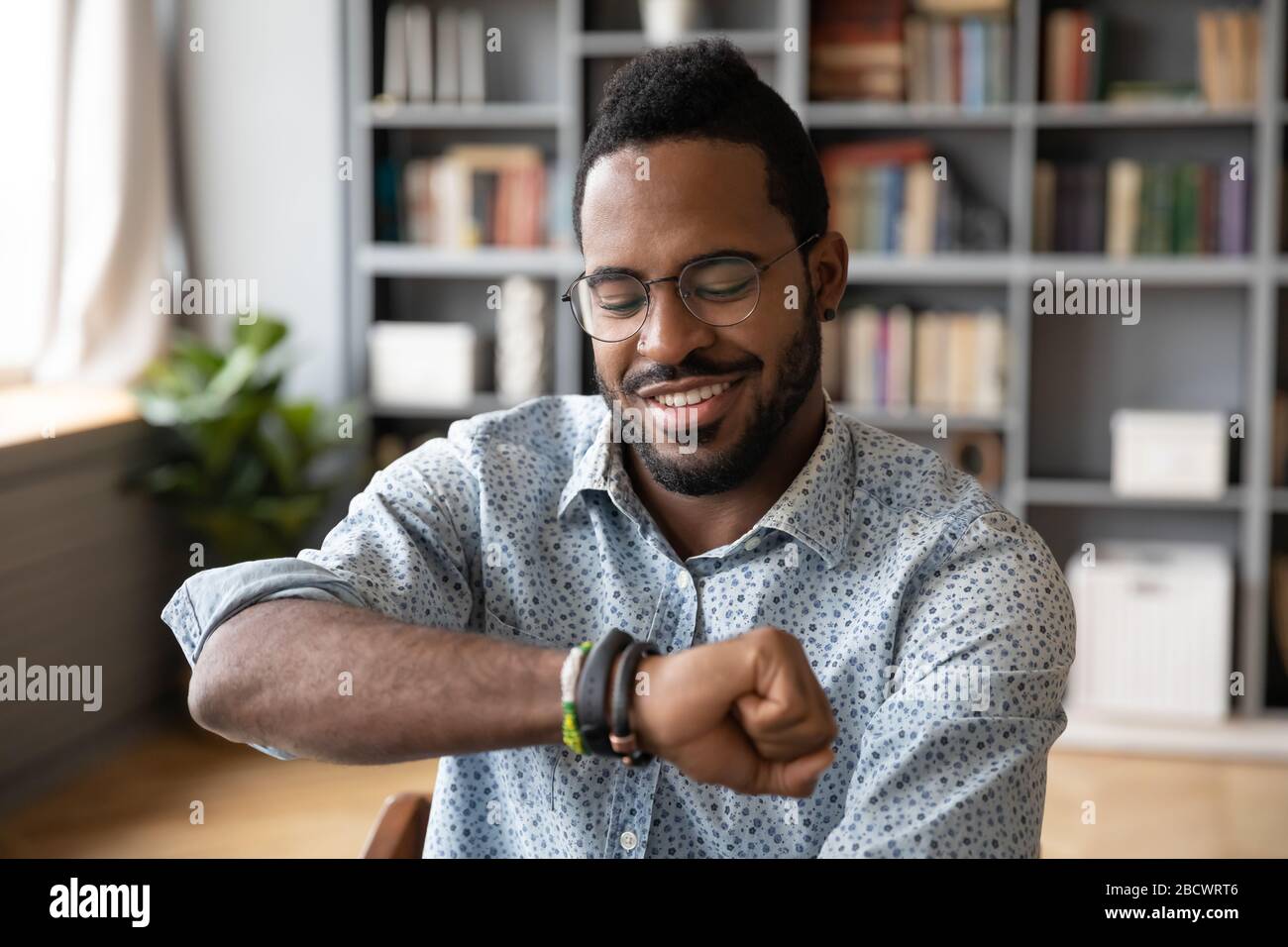 Business man watch time check hi-res stock photography and images - Alamy
