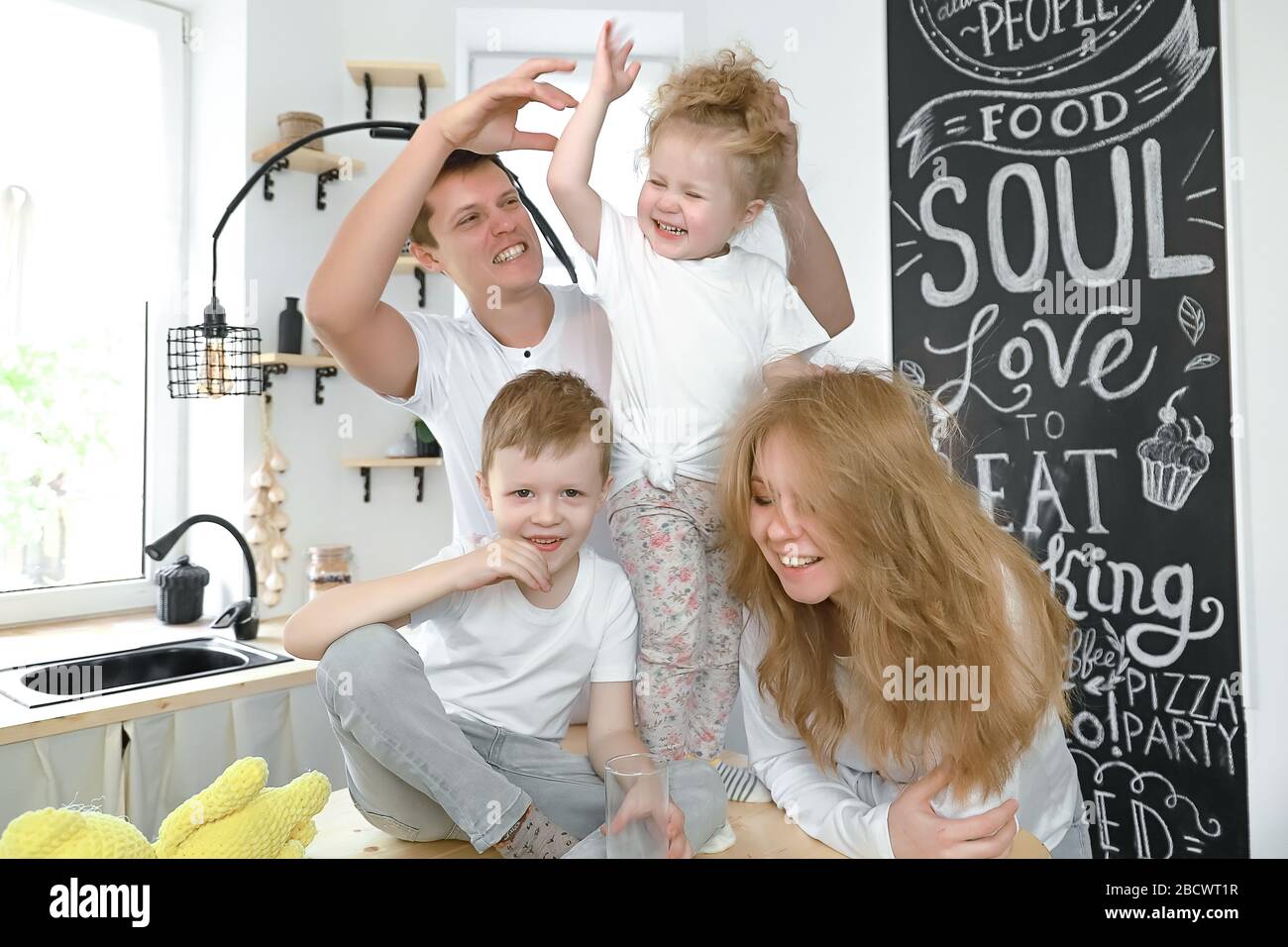 Happy family at home spending time together and playing. Crazy family ...