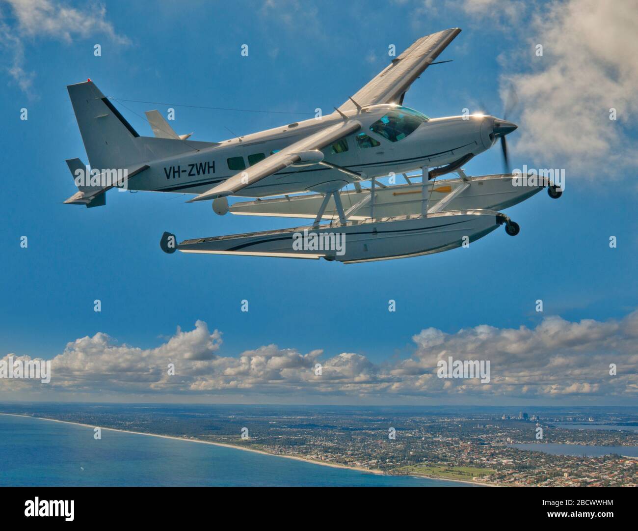 An air-to-air shot of a Cessna 208 Grand Caravan float plane Stock ...