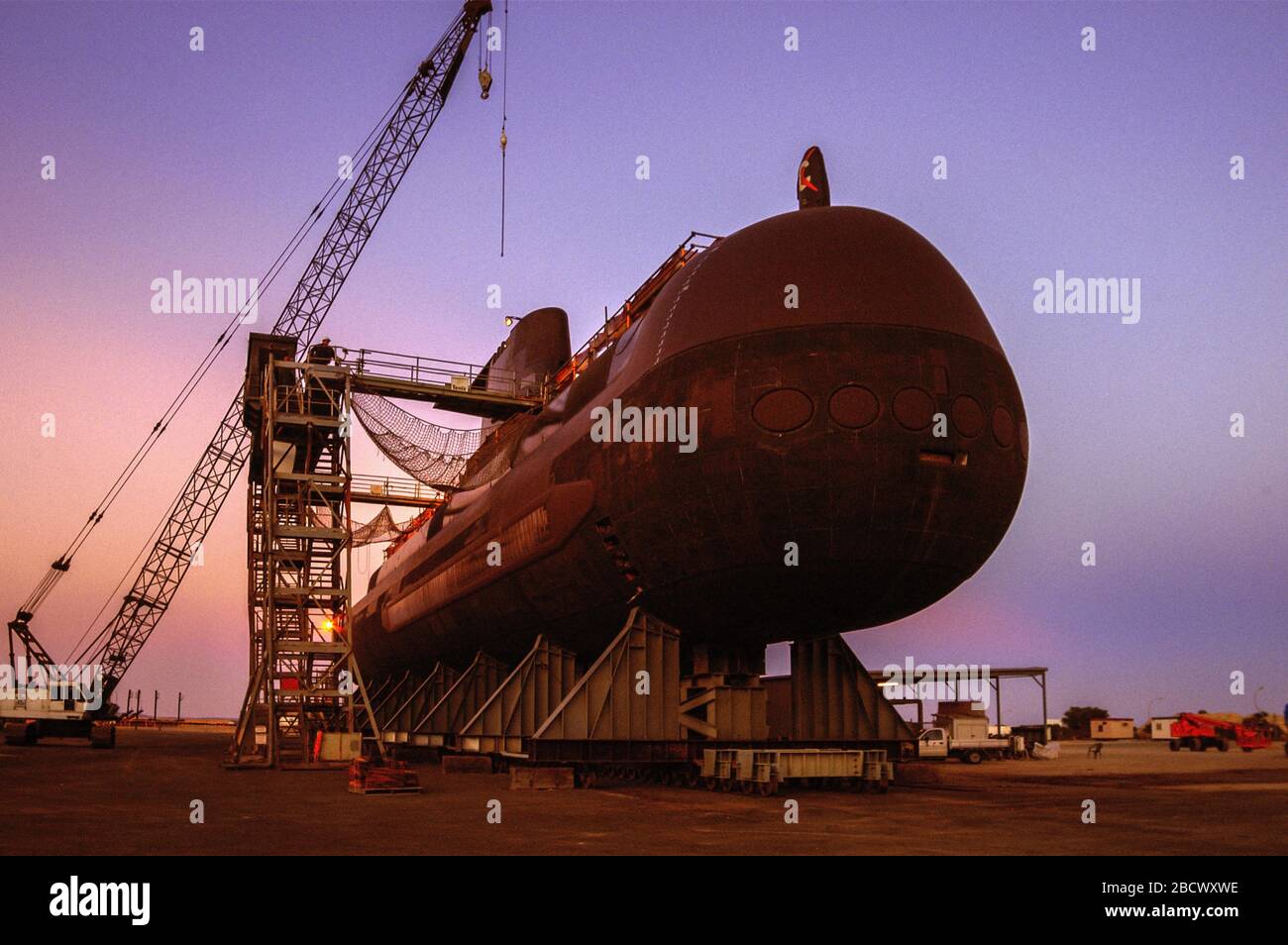 An Australian Navy Collins Class submarine at dawn, undergoing periodic ...