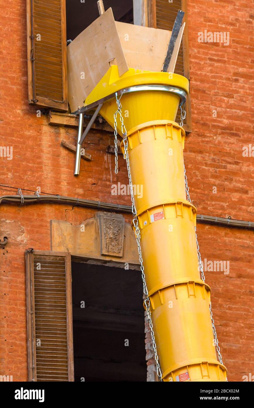 chute for transport of building materials in a house Stock Photo - Alamy